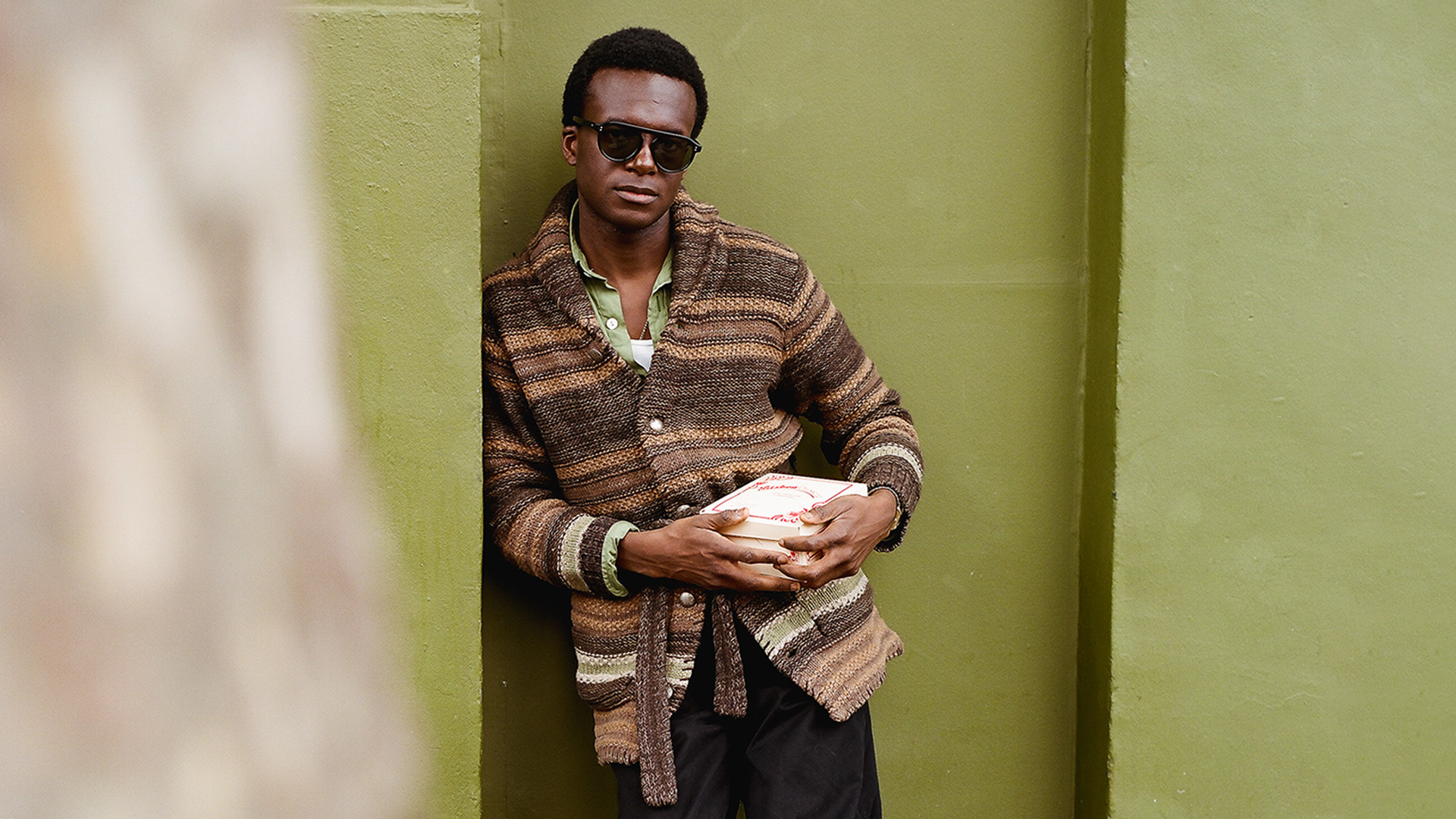Get loose: André Larnyoh’s RRL cardigan | Thomas Mason